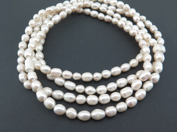 Freshwater Pearl Ivory Rice Beads 10-11mm ~ 16" Strand